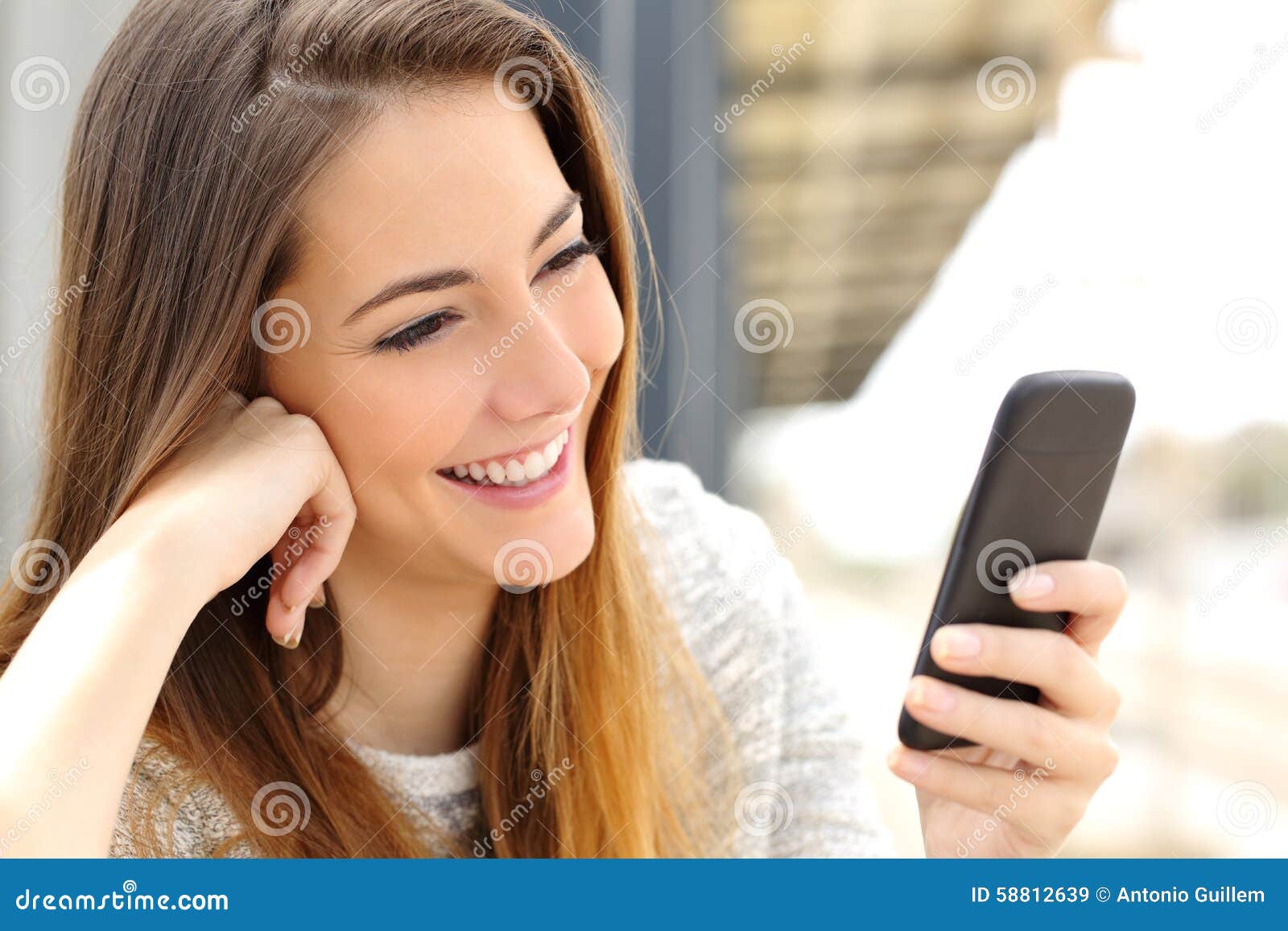 Woman Browsing Media in a Mobile Phone Stock Image - Image of girl ...