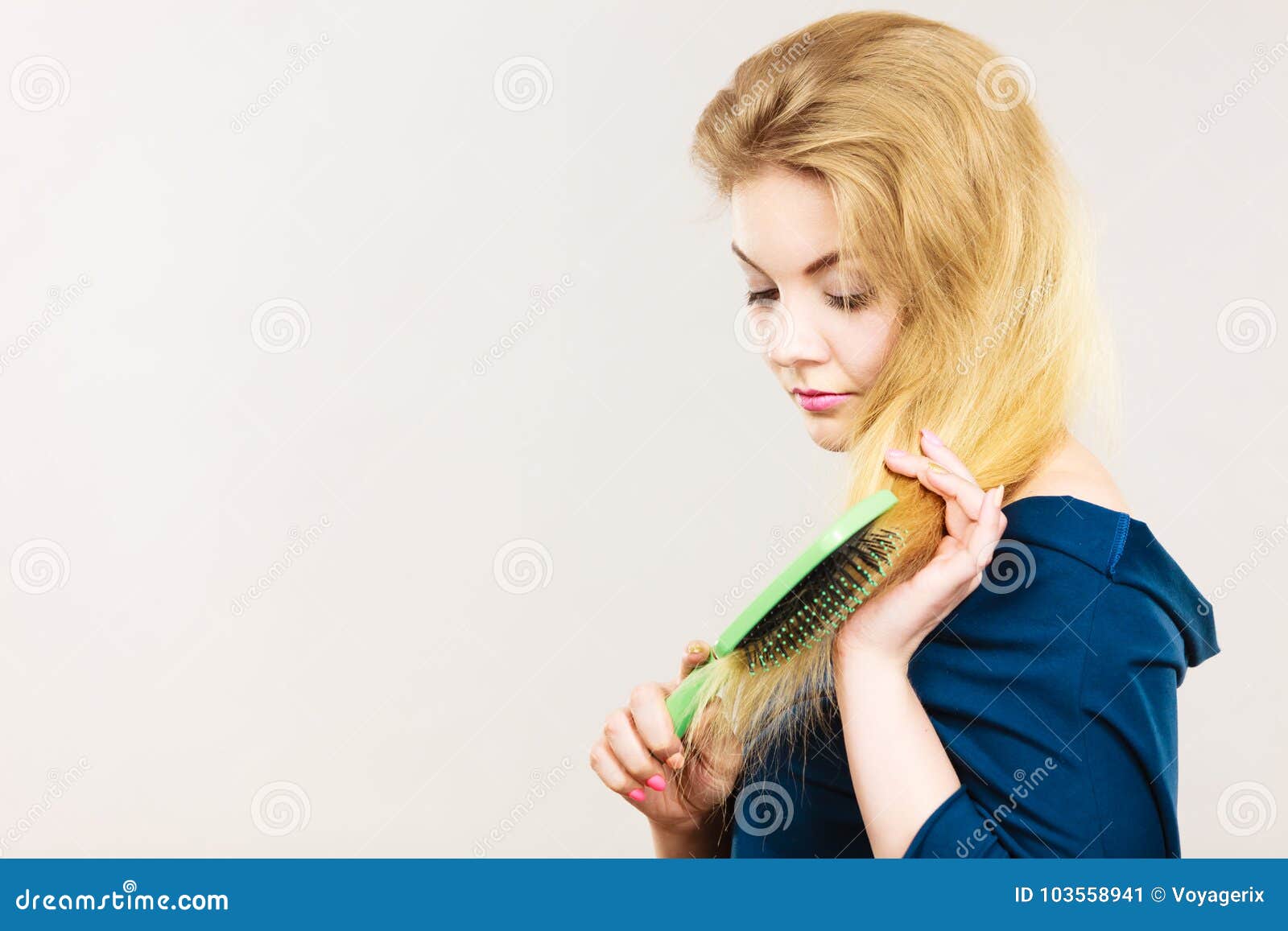 Woman Brushing Her Long Blonde Hair Stock Image Image Of Tangled