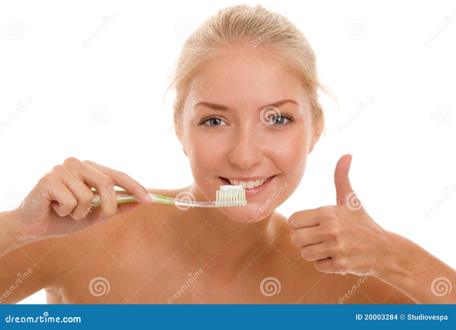 Woman brushing her teeth stock photo. Image of beauty - 20003284