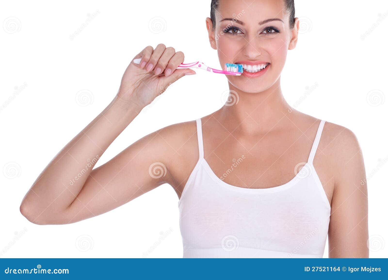 Woman brushing her teeth stock photo. Image of brushing - 27521164