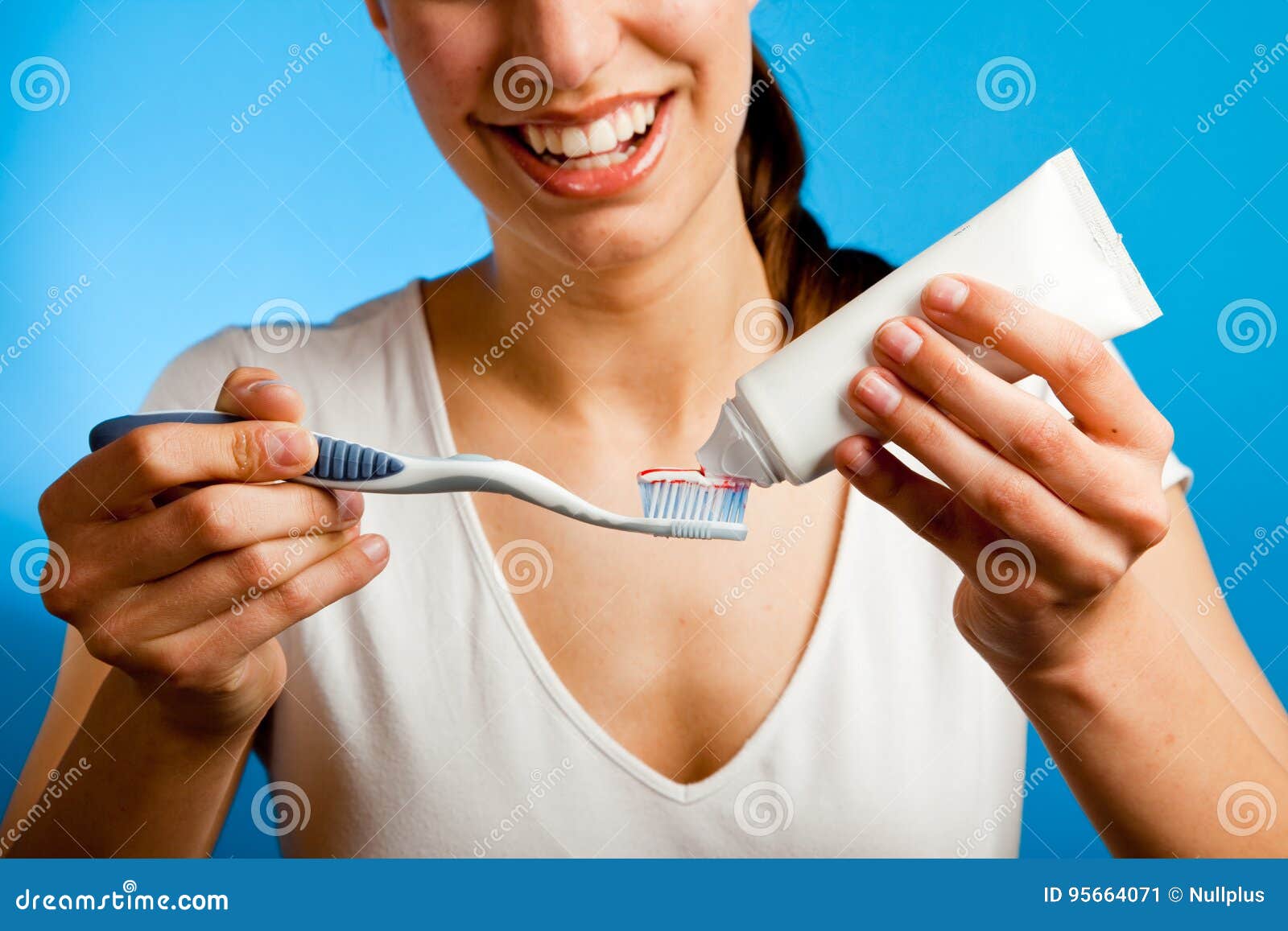 Woman Brushing Her Teeth stock image. Image of woman - 95664071