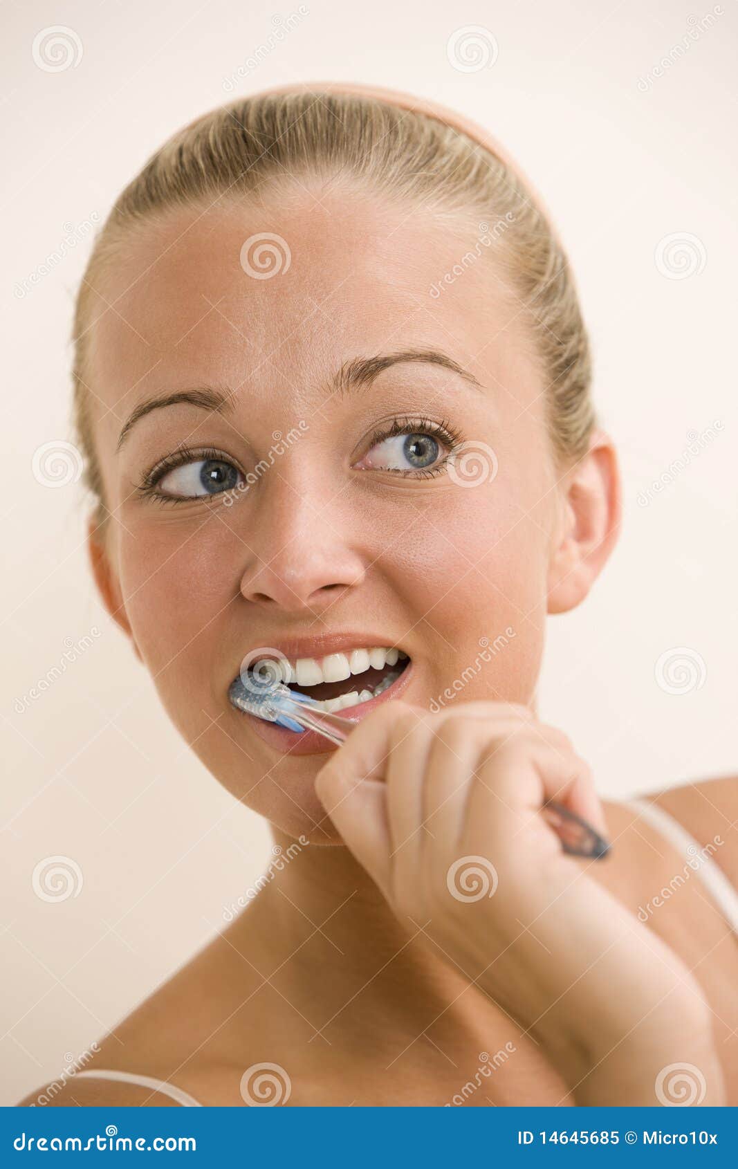 Woman Brushing Teeth stock image. Image of dental, blue - 14645685