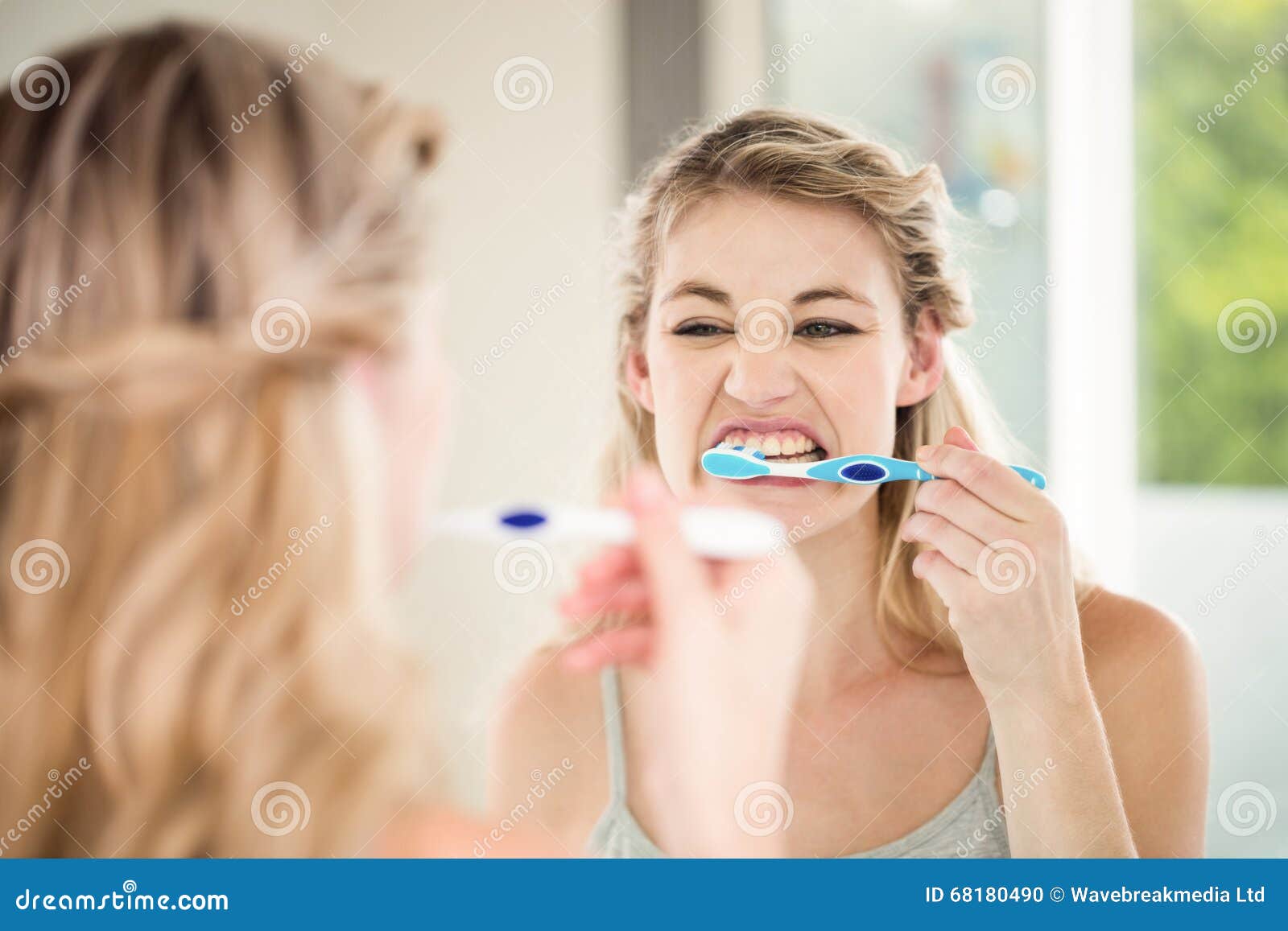 Woman brushing teeth stock photo. Image of adult, brushing - 68180490