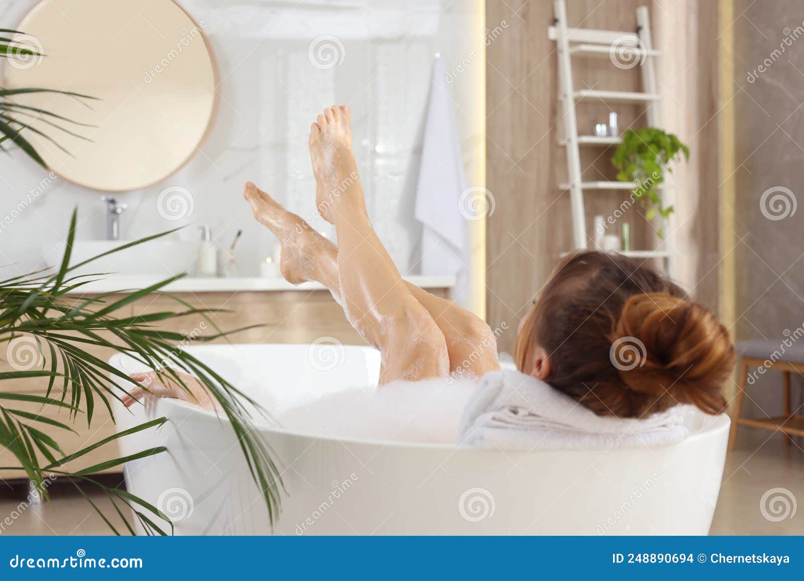 Woman Enjoying Bubble Bath at Home, Back View Stock Photo - Image of ...