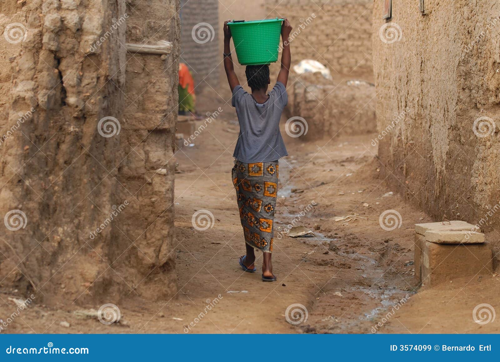 Woman with bucket stock image. Image of squalor, dwelling - 3574099