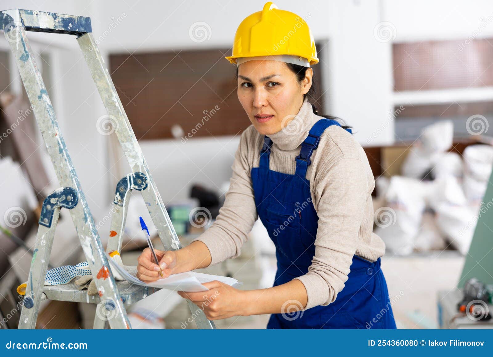 Woman Signs an Act of Acceptance of Completed Work Stock Photo - Image ...