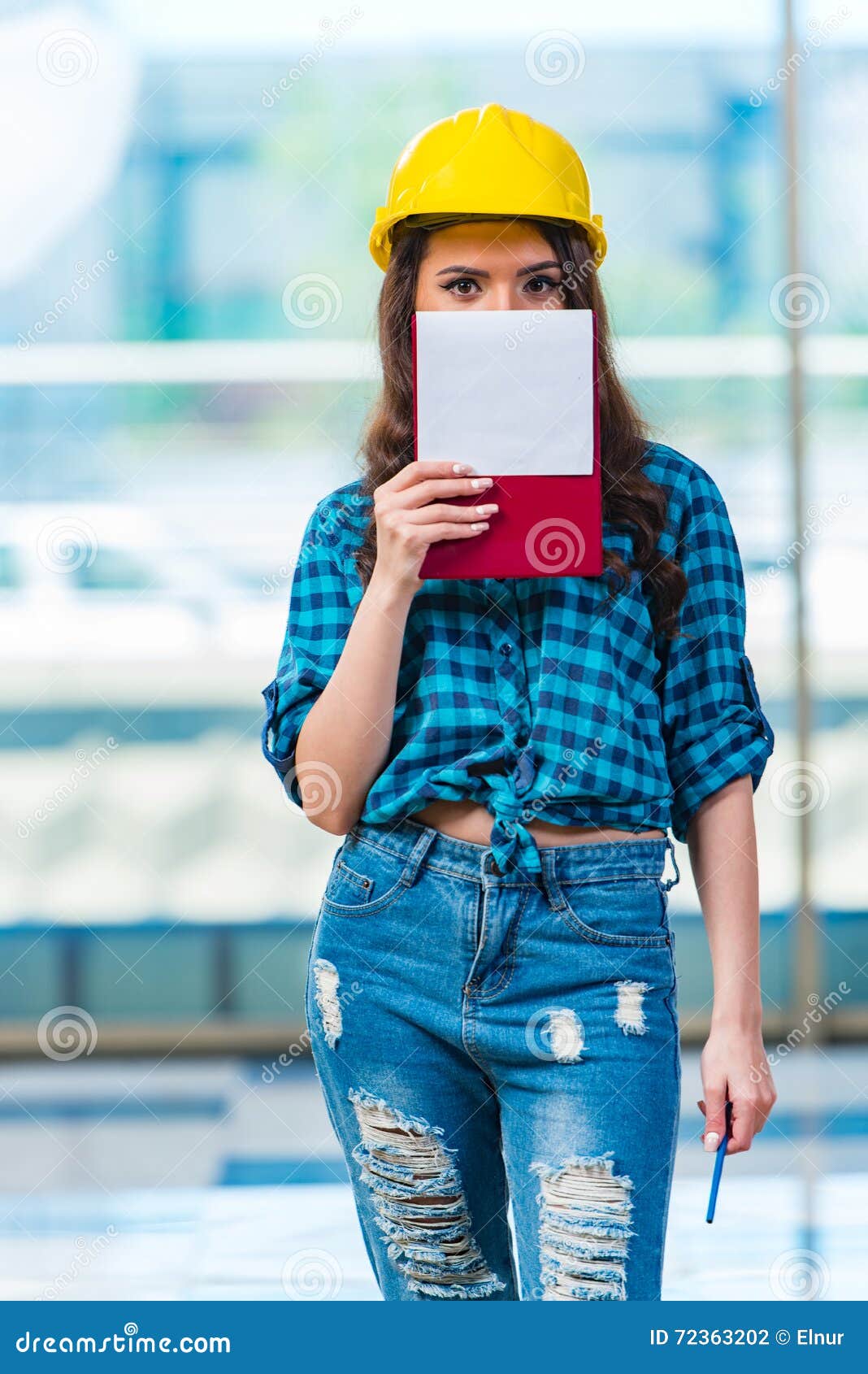 The Woman Builder Taking Notes at Construction Site Stock Photo - Image ...