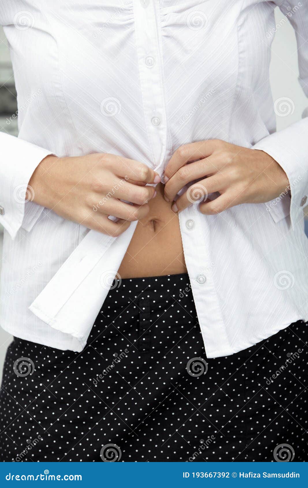 Woman Buttoning Her Shirt. Conceptual Image Shot Stock Photo - Image of ...