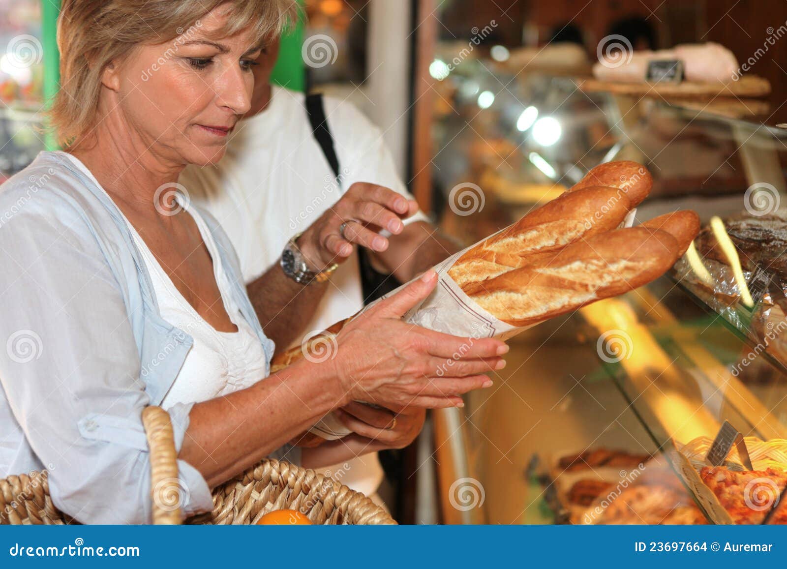 Woman buying bread stock photo. Image of hair, casual - 23697664