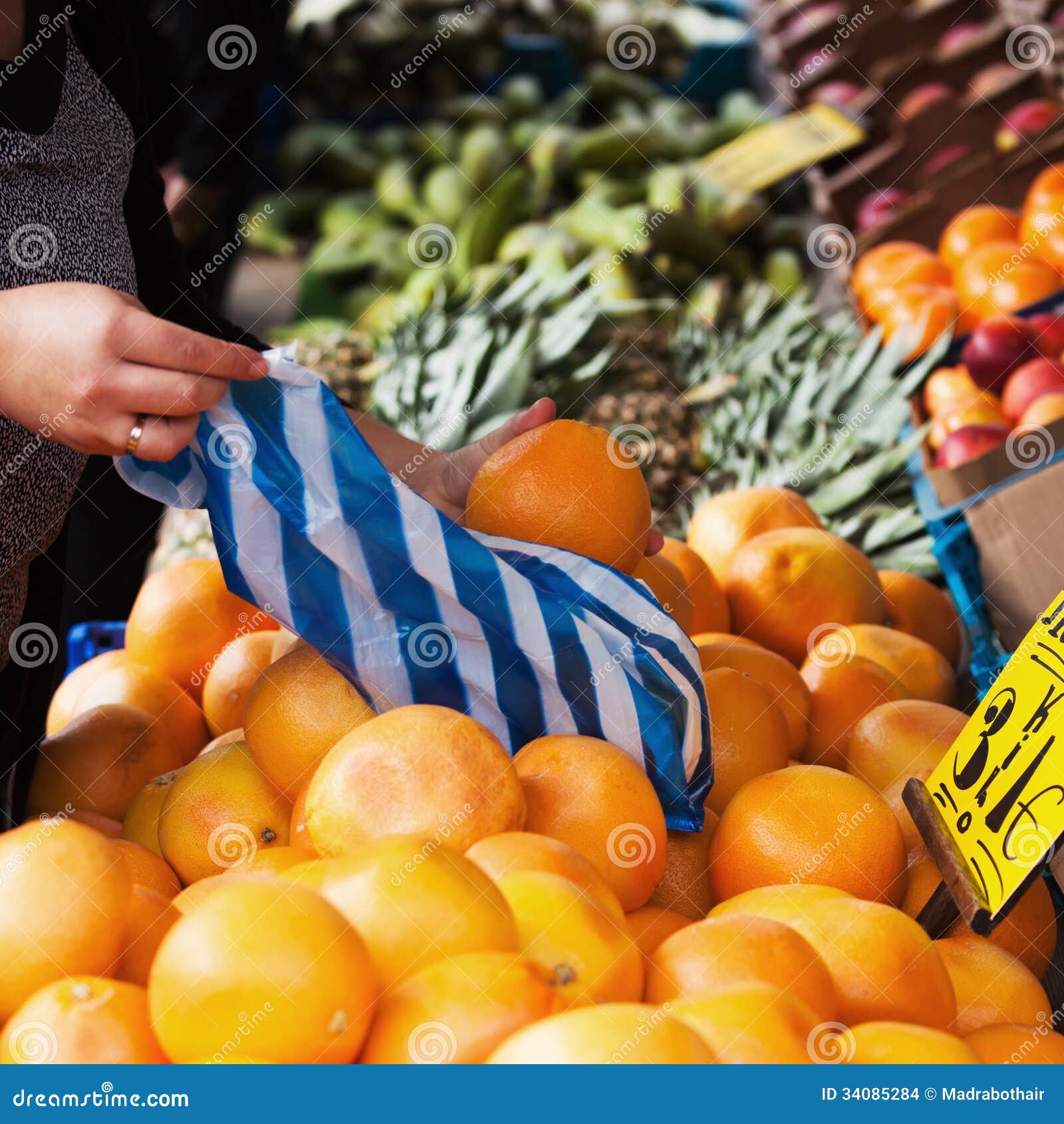 Woman buys oranges stock photo. Image of farmers, hand - 34085284