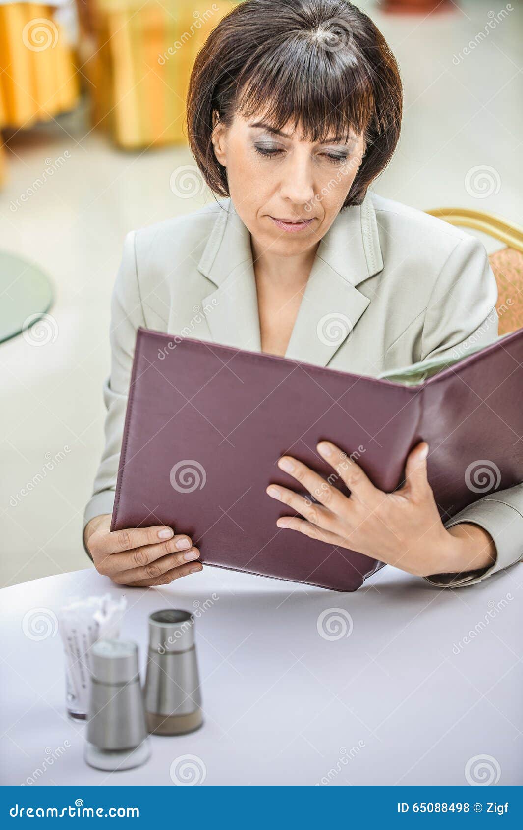Woman cafe reading menu stock photo. Image of businesswoman - 65088498