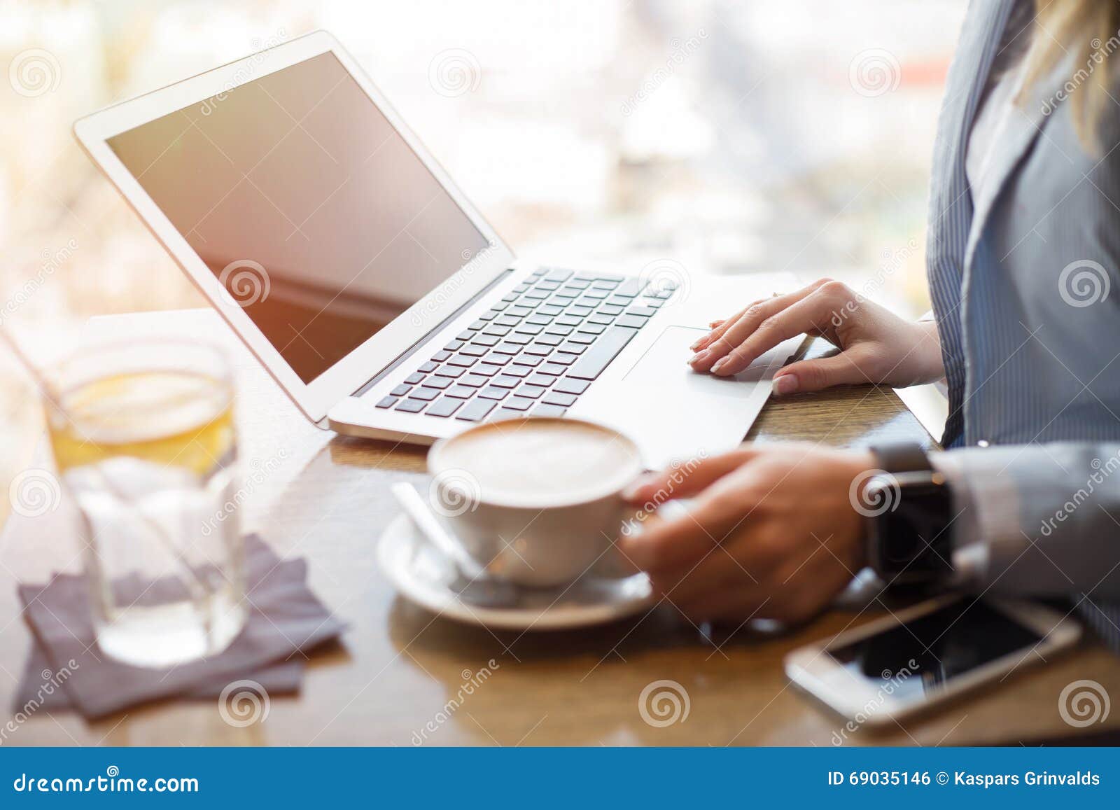 Woman in Cafe Working on Portable Computer Stock Photo - Image of ...