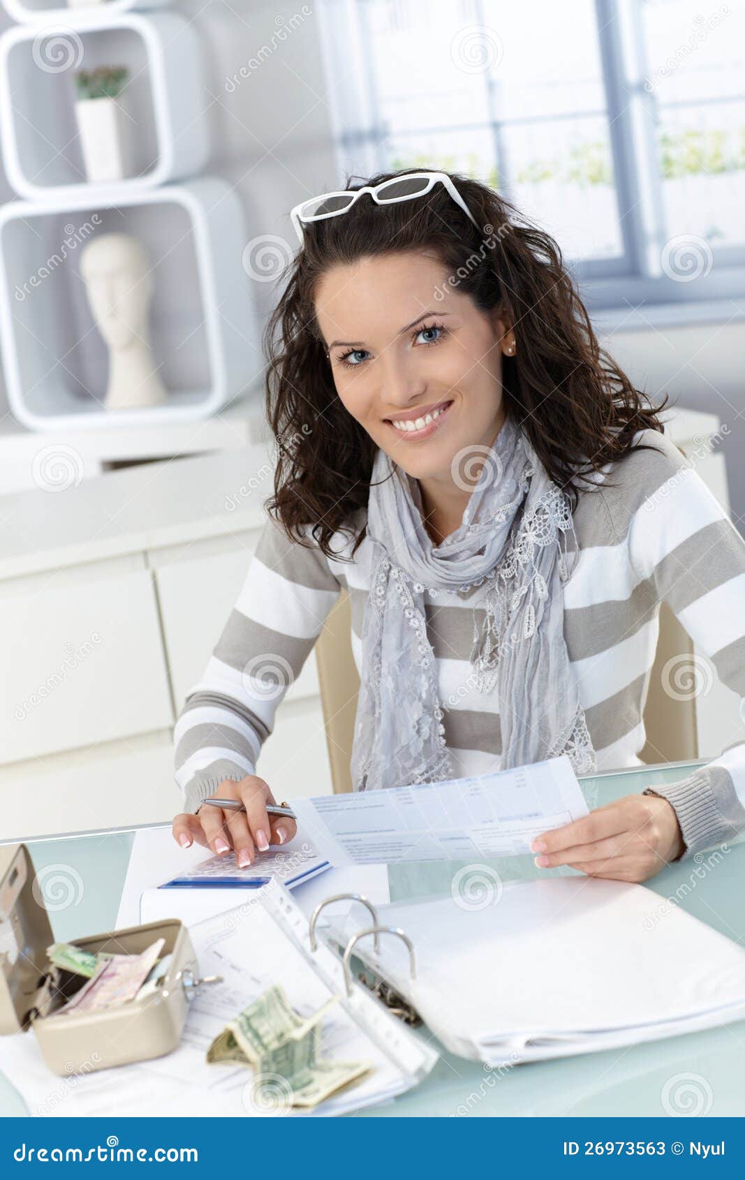 Woman calculating finances stock image. Image of financial - 26973563