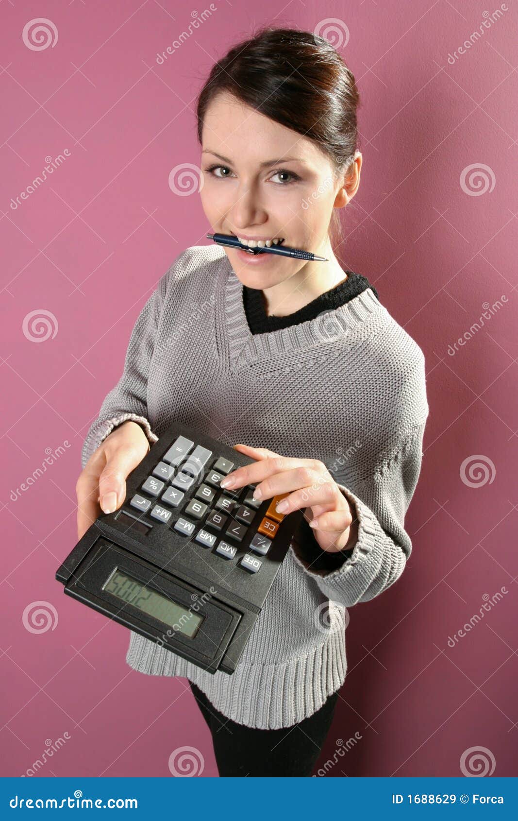Woman with calculator stock image. Image of pink, smart - 1688629