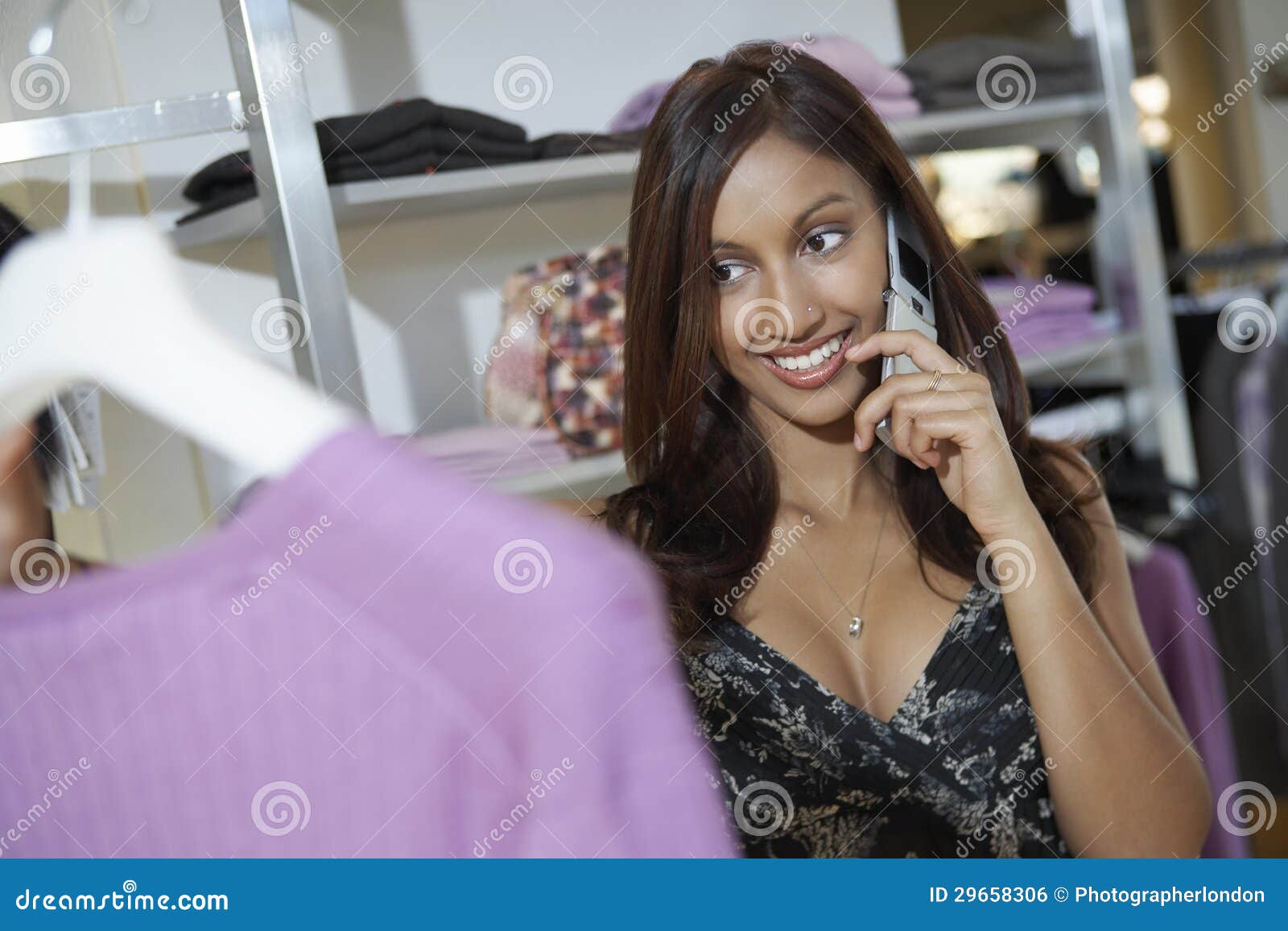 Woman on Call in Clothes Shop Stock Photo - Image of purchase ...