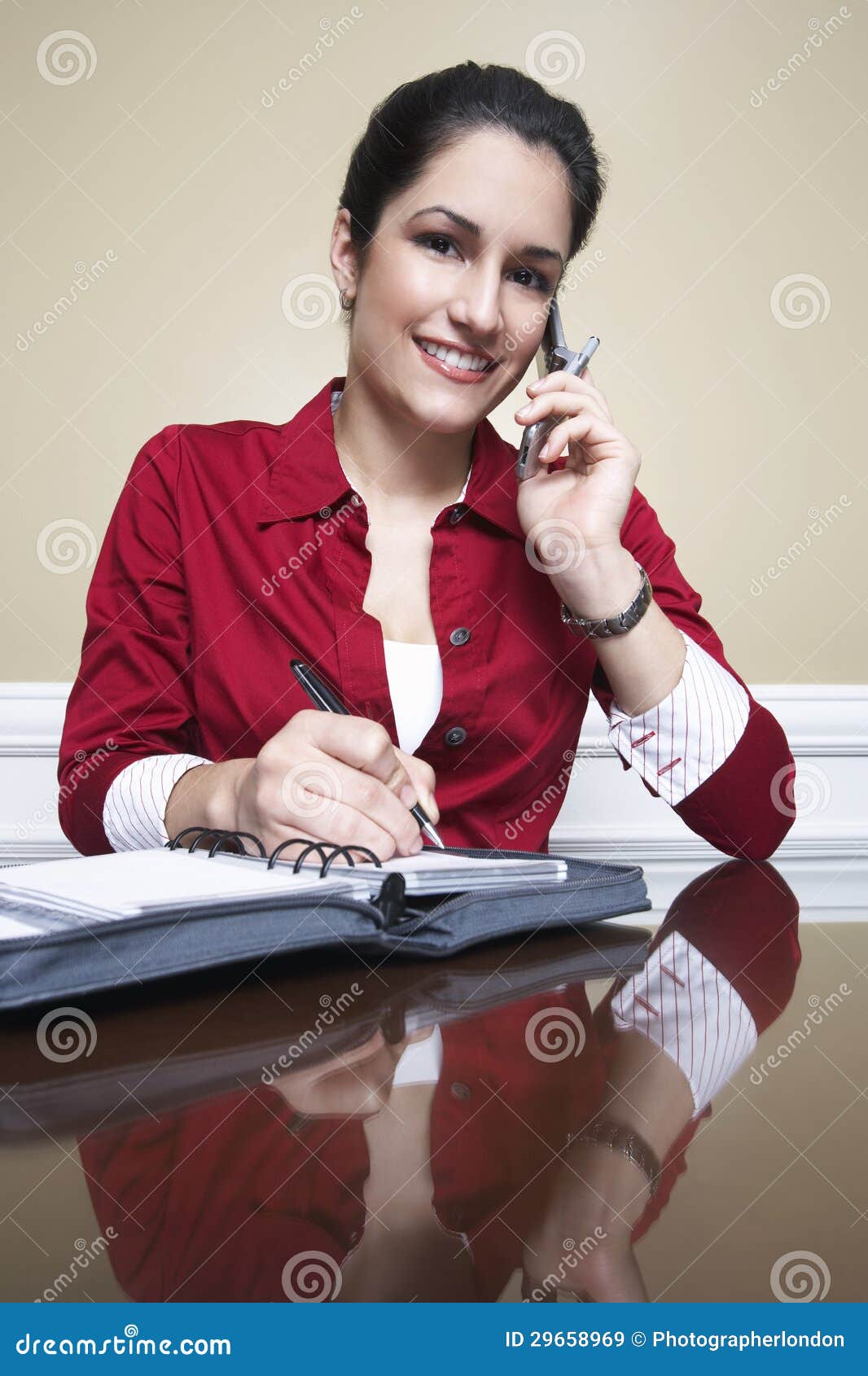 Woman on Call Taking Notes stock image. Image of beautiful - 29658969