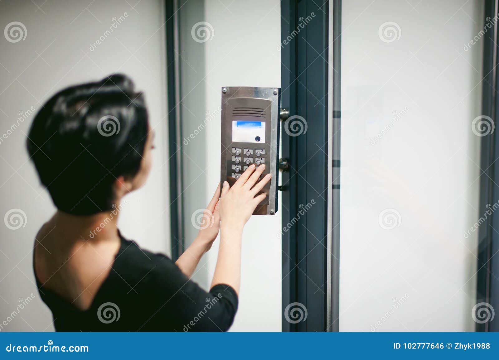 Woman is Calling on the Intercom Stock Photo - Image of electronic ...