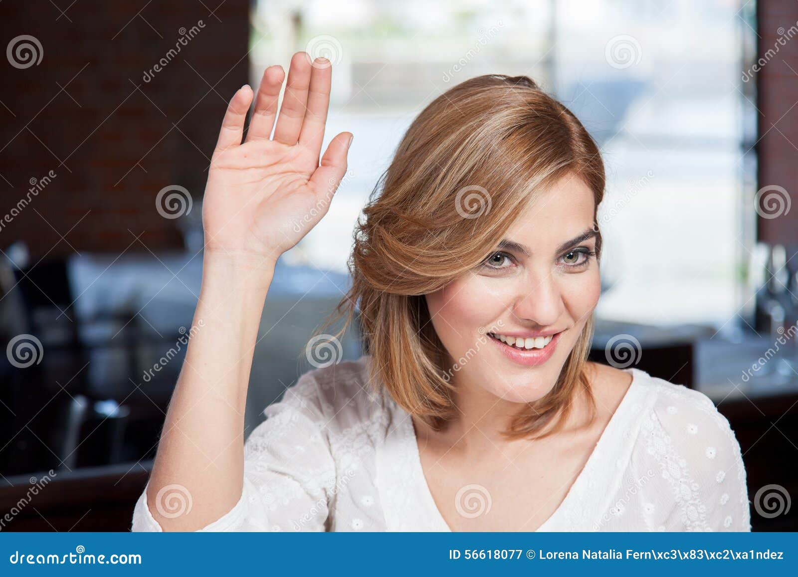 Woman calls the waiter stock image. Image of hotel, argentina - 56618077