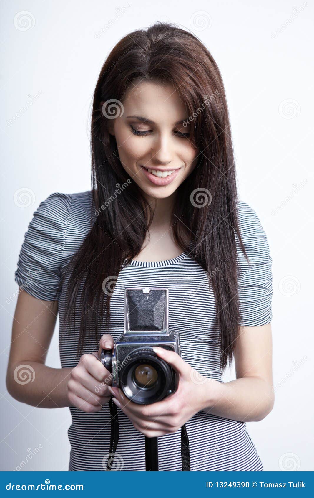 Woman with camera stock photo. Image of holding, brunette - 13249390