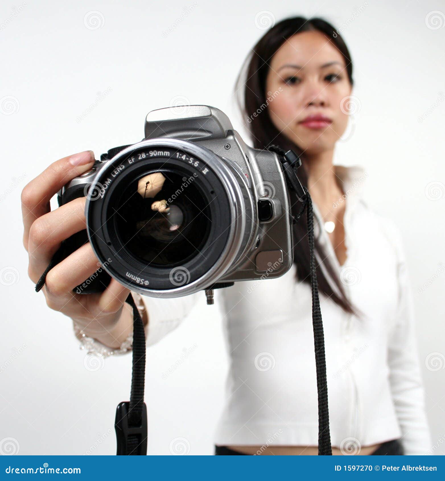 Woman and camera stock photo. Image of indoors, working - 1597270