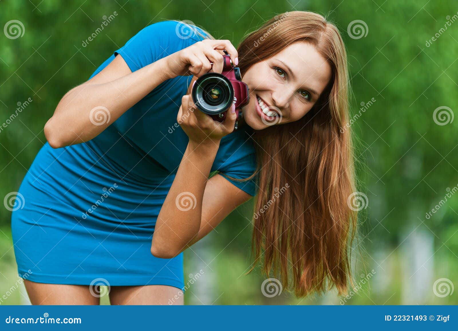Stock Photos: Woman with camera. Image: 22321493