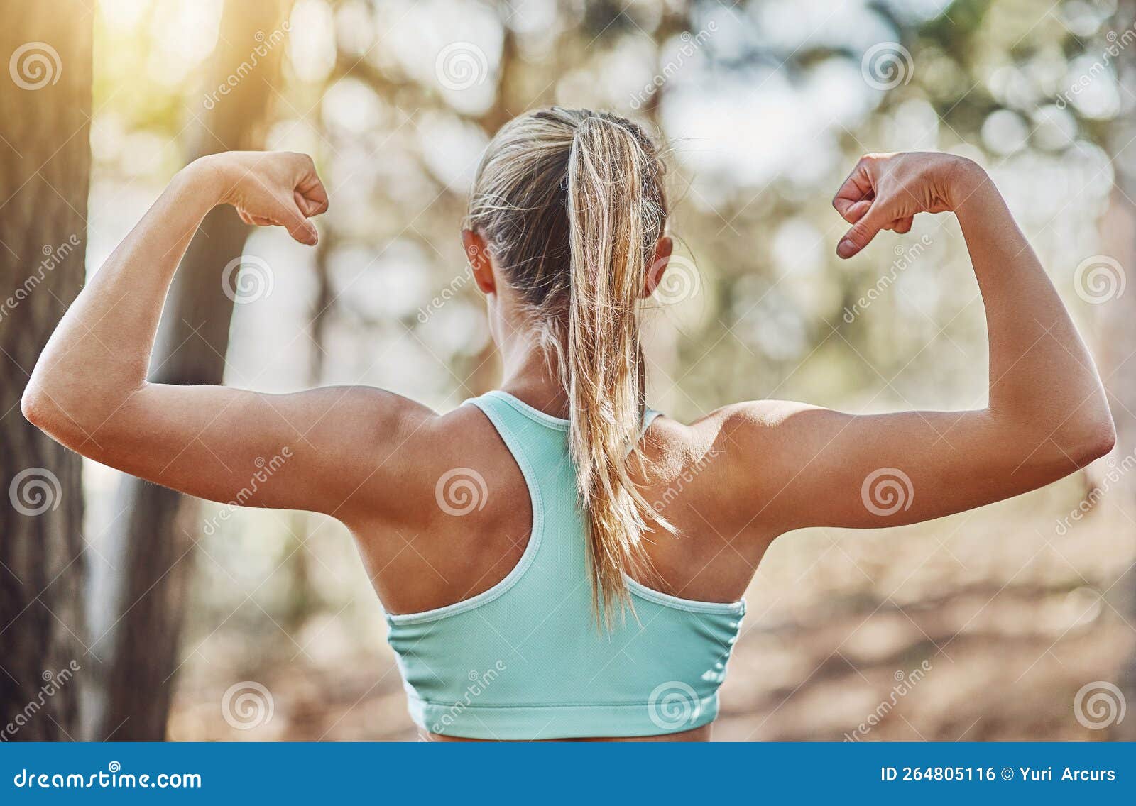 Woman Can Flex Too. a Young Woman Flexing Her Arms Outdoors. Stock ...