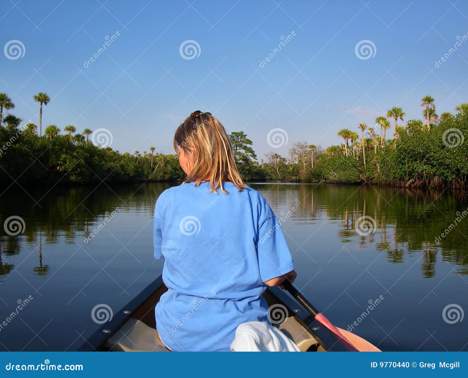 Woman in Canoe stock photo. Image of outside, scenery - 9770440