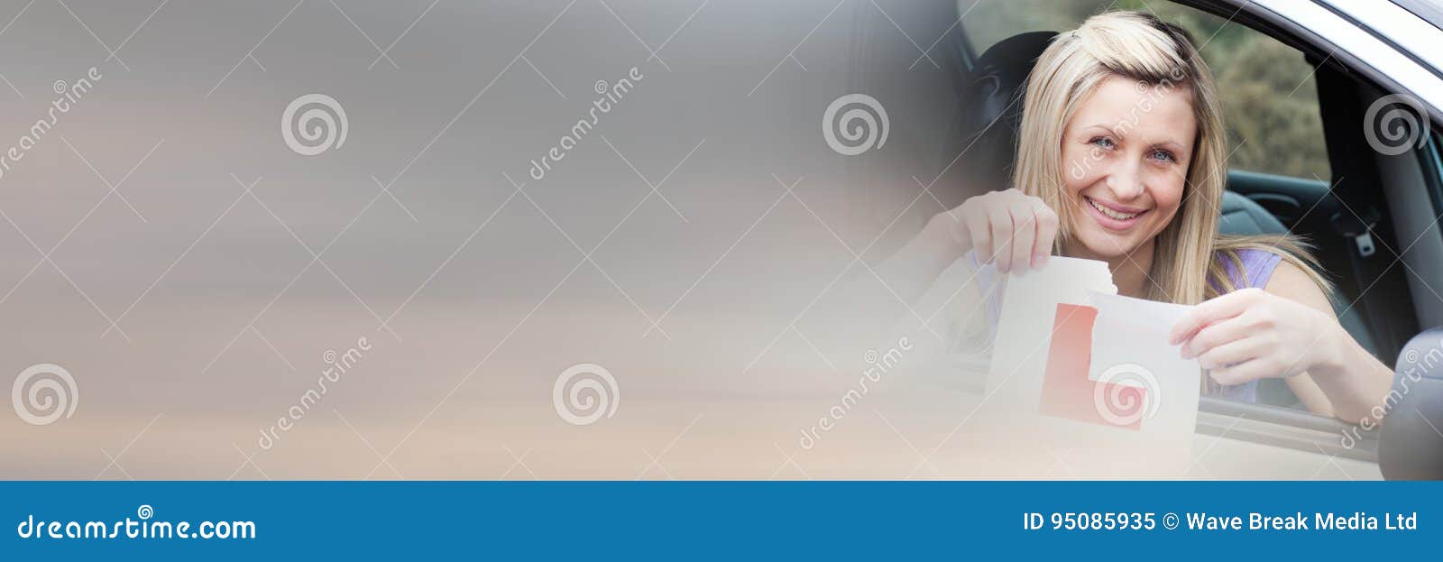 Woman in Car with Learner L Sign Ripping with Transition Stock Image ...