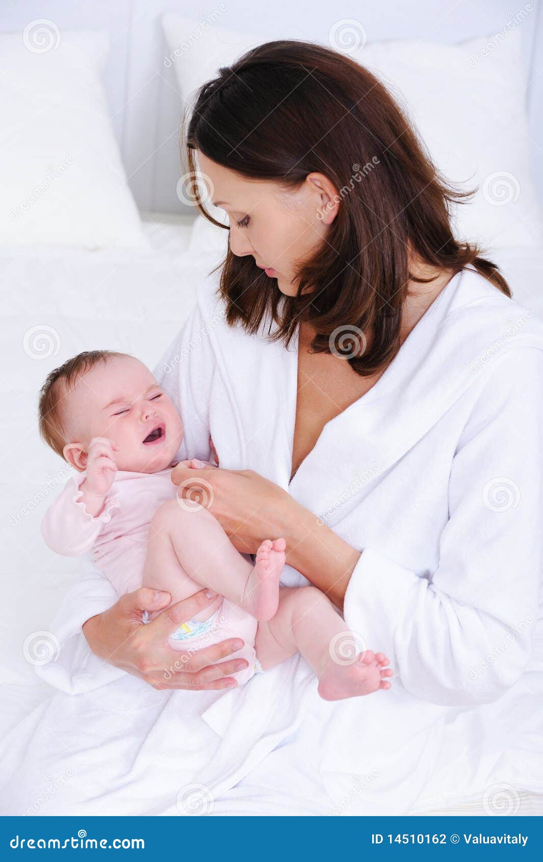 Woman caring about baby stock photo. Image of innocence - 14510162