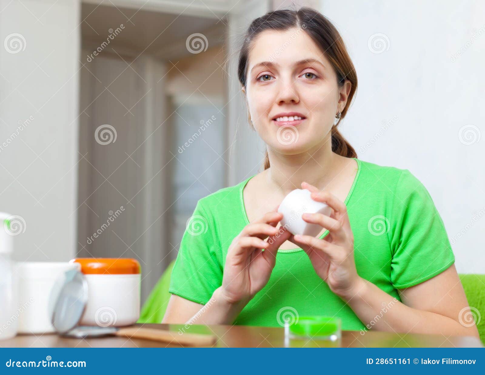Woman Caring for Face with Cosmetics Stock Image - Image of applying ...