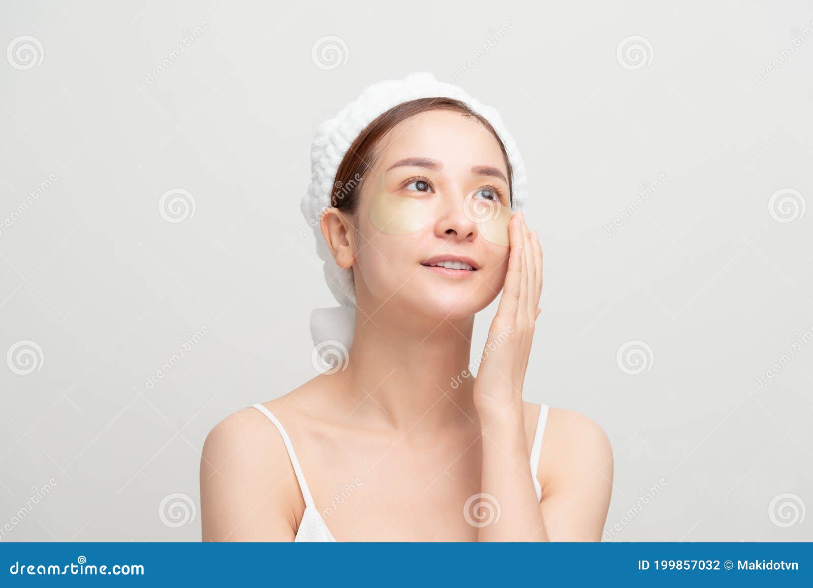 A Woman Caring for Her Face with Patches Stock Photo - Image of ...