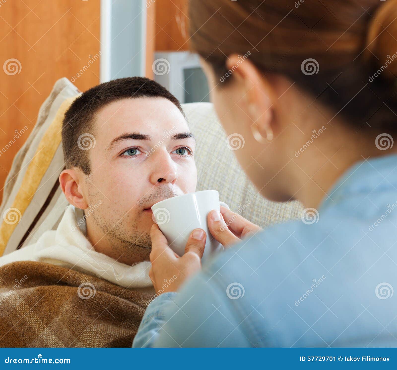 Woman Caring for Unwell Husband Stock Image - Image of love, drug: 37729701