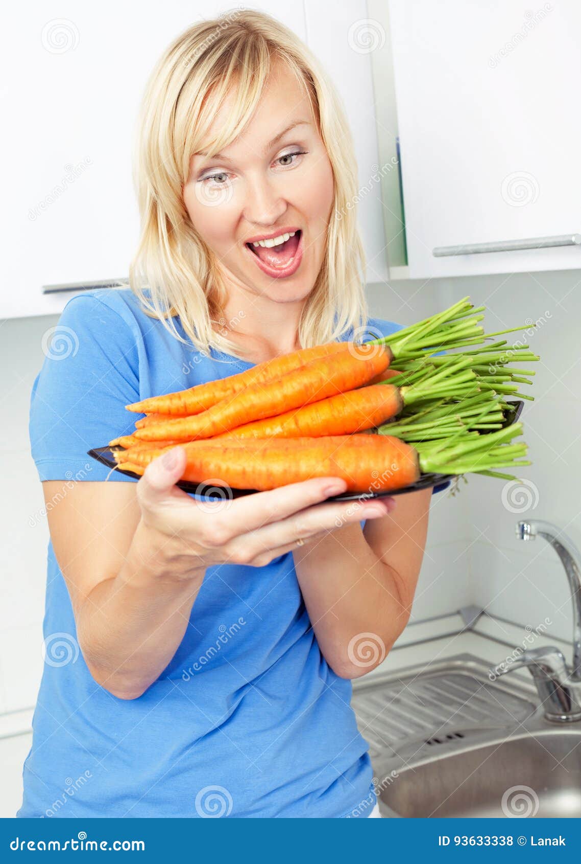 Woman with carrot stock photo. Image of house, happy - 93633338