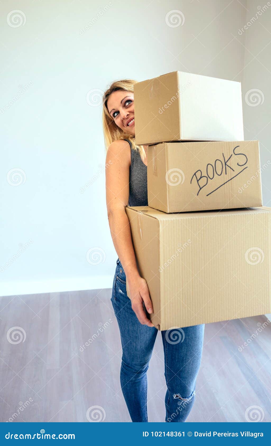 Woman Carrying Moving Boxes Stock Image - Image of casual, home: 102148361