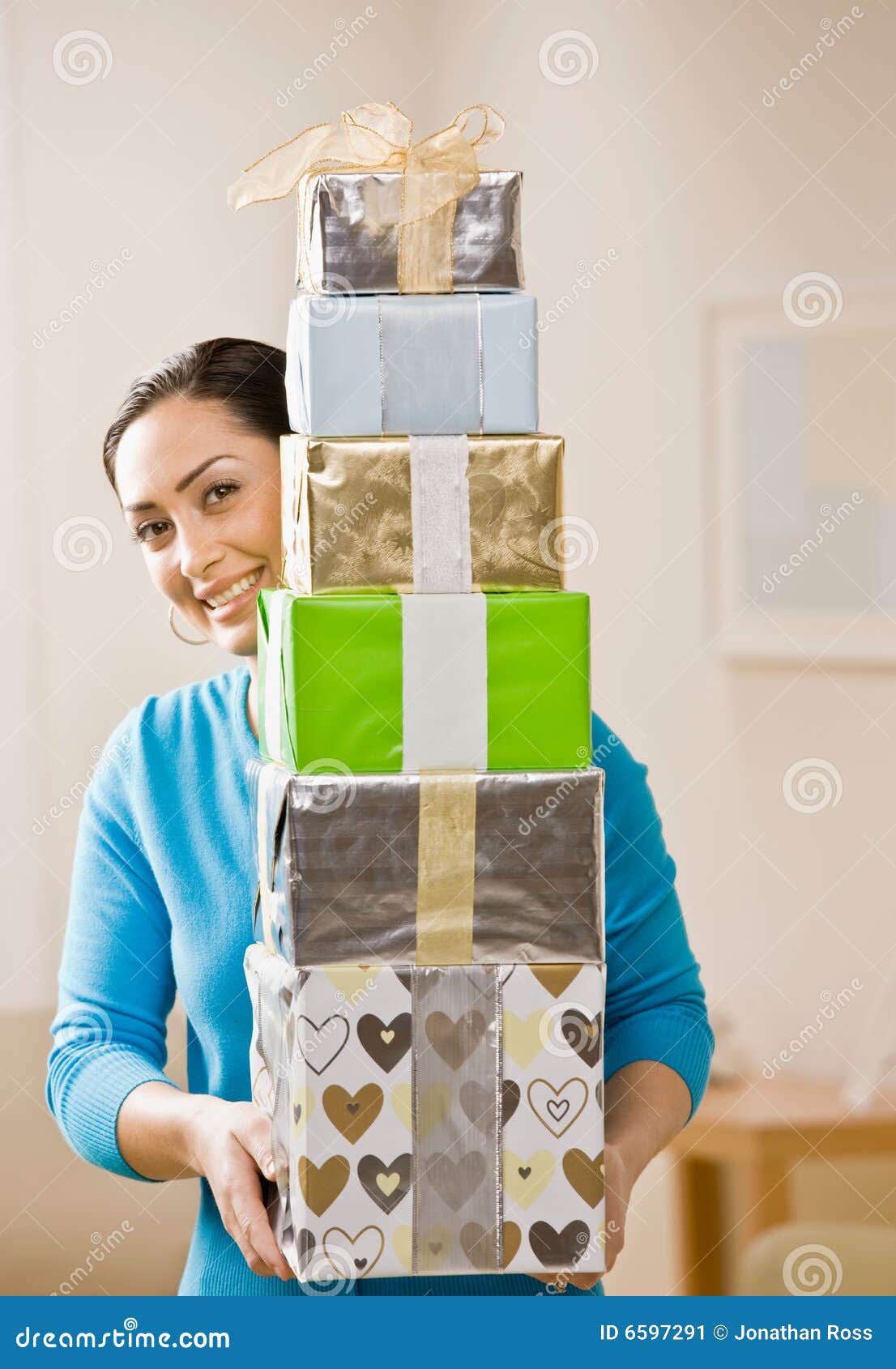 Woman Carrying Stack of Festive Birthday Gifts Stock Image - Image of ...
