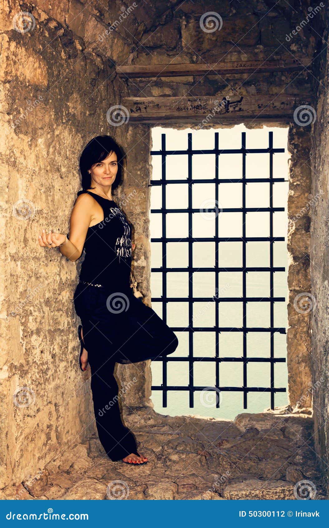 Woman in the castle stock photo. Image of grille, architecture - 50300112