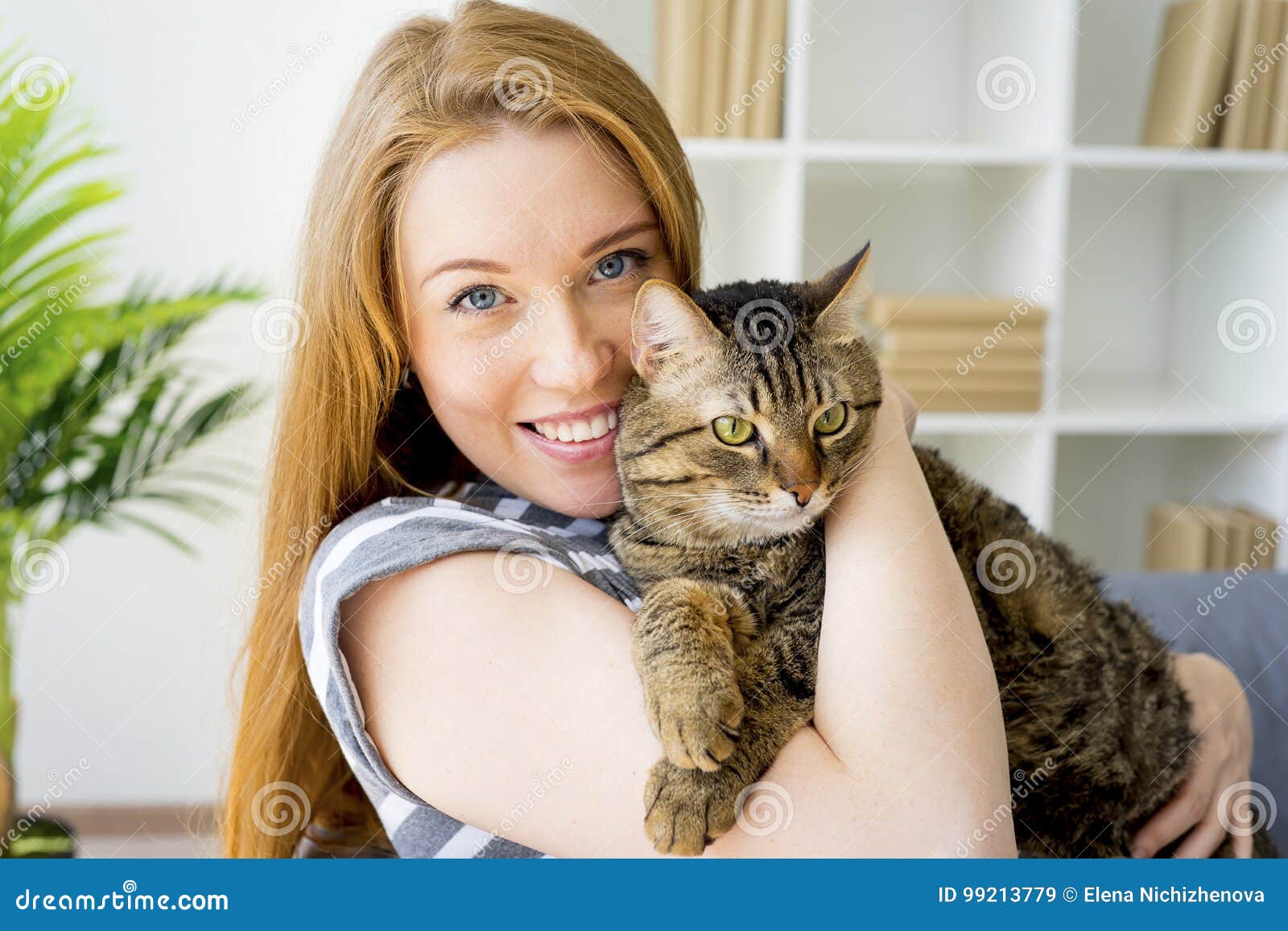 Woman with a cat stock image. Image of domestic, interior - 99213779