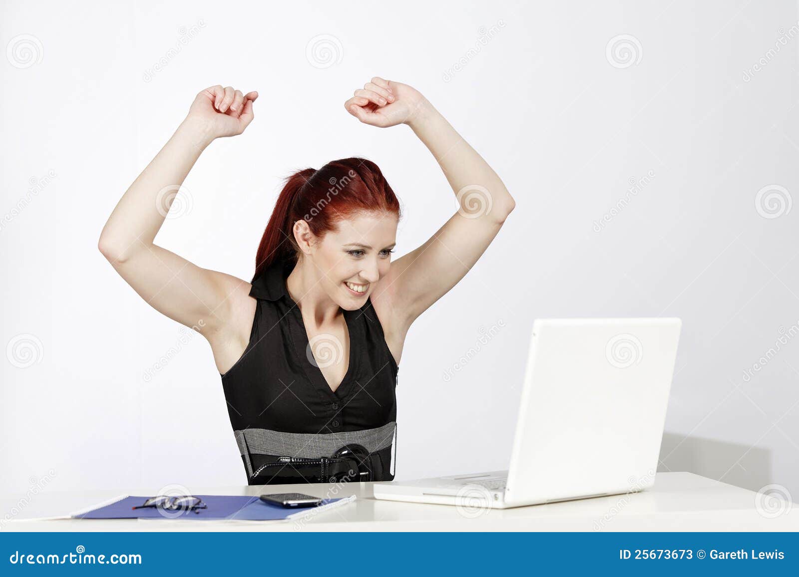 Woman celebrating at work stock image. Image of young - 25673673