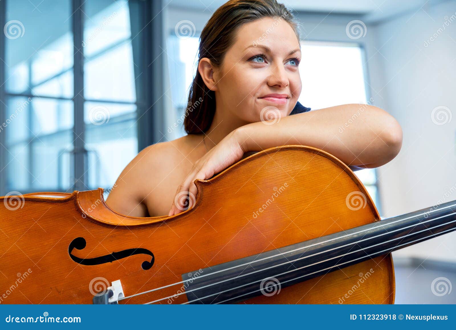 Woman with a cello stock photo. Image of symphony, cellist - 112323918
