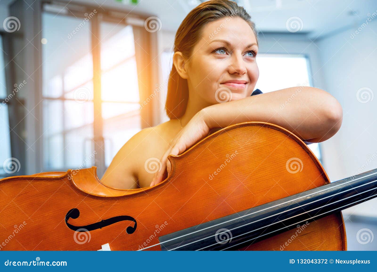 Woman with a cello stock photo. Image of studio, adult - 132043372