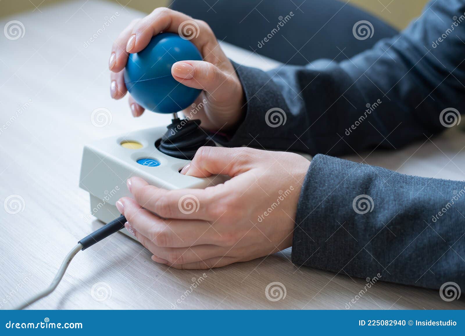 Woman with Cerebral Palsy Works on a Specialized Computer Mouse. Stock ...