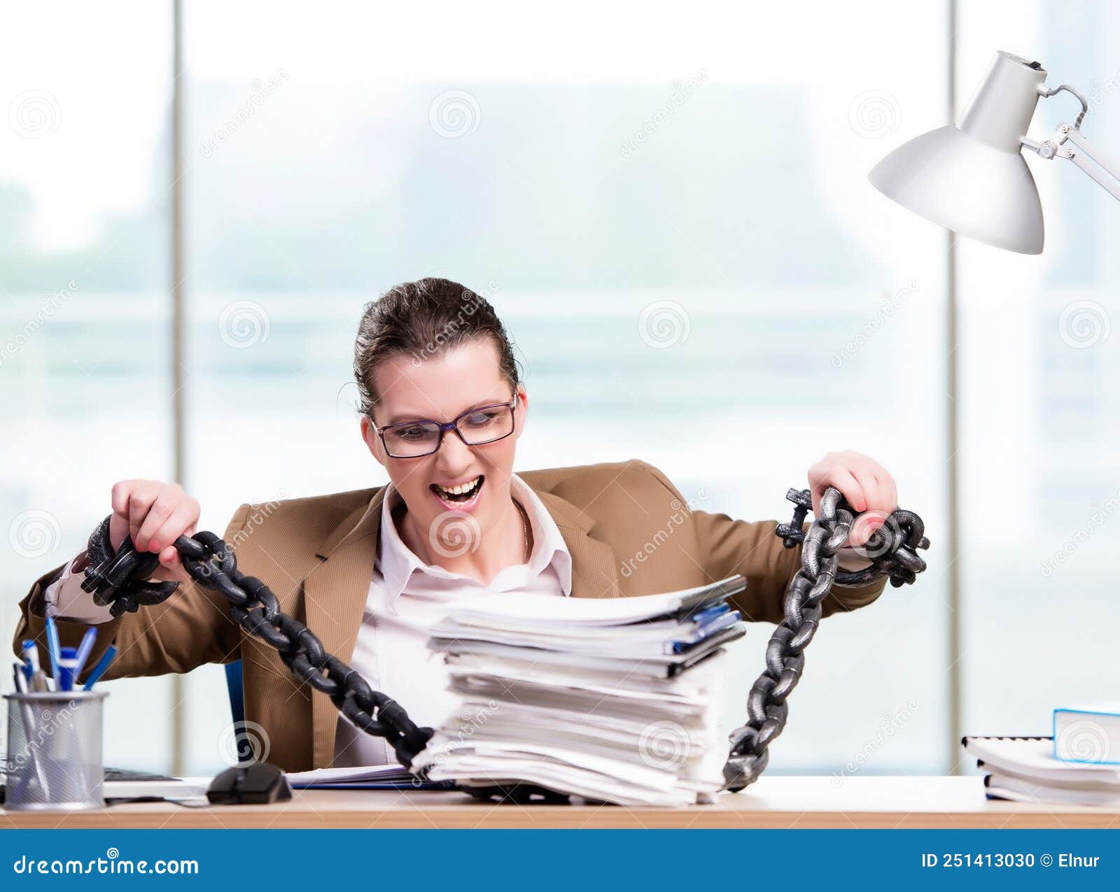 Woman Chained To Her Working Desk Stock Photo - Image of computer ...