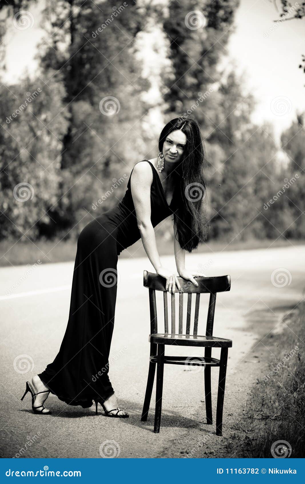 Woman with chair stock photo. Image of pose, expression - 11163782