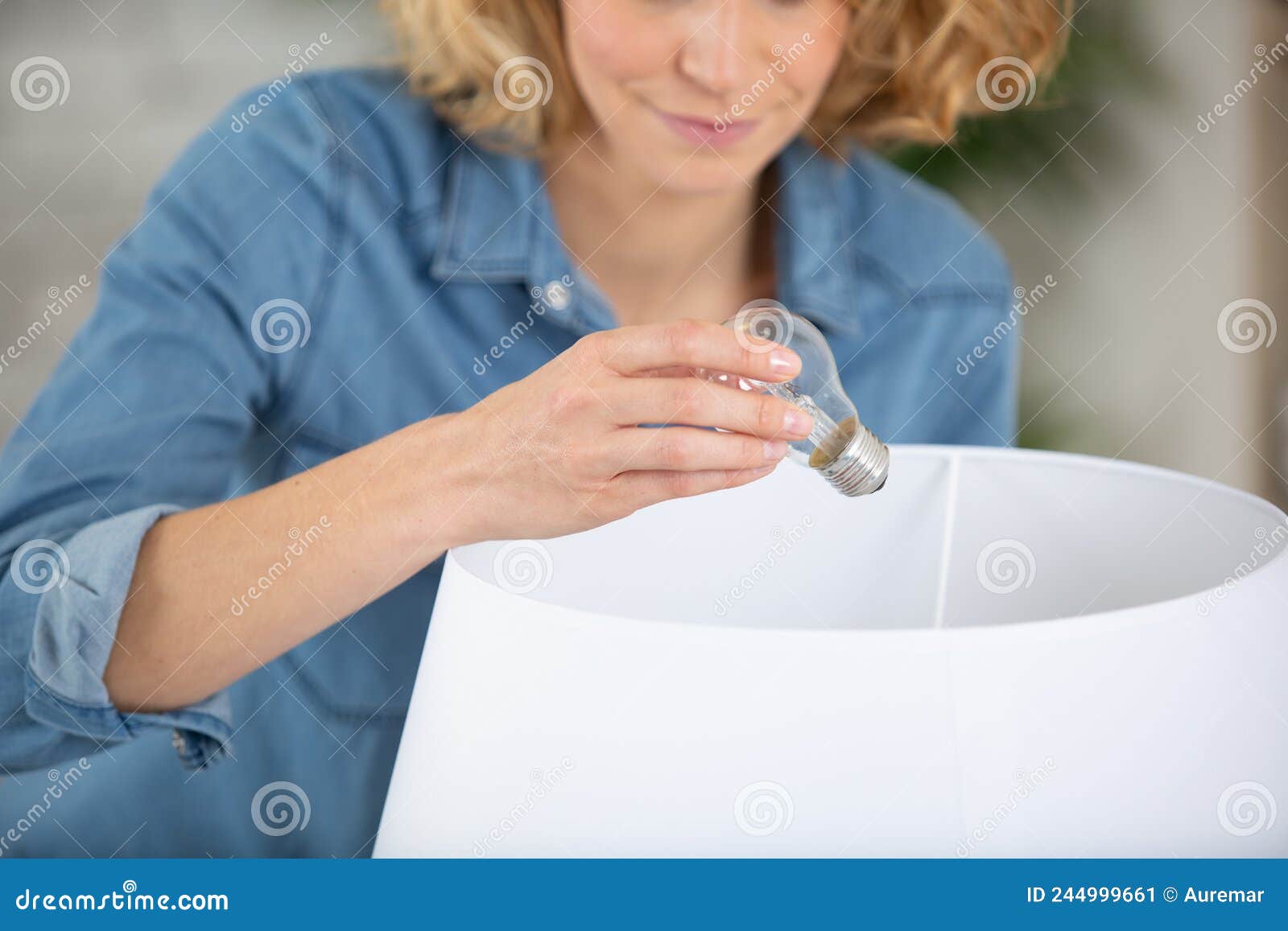 Woman Changing Light Bulb in Lamp Indoors Stock Image - Image of ...