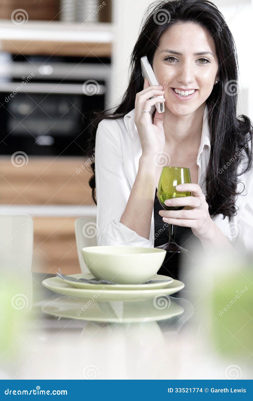 Woman Chatting on Her Mobile Phone Stock Photo - Image of stool ...