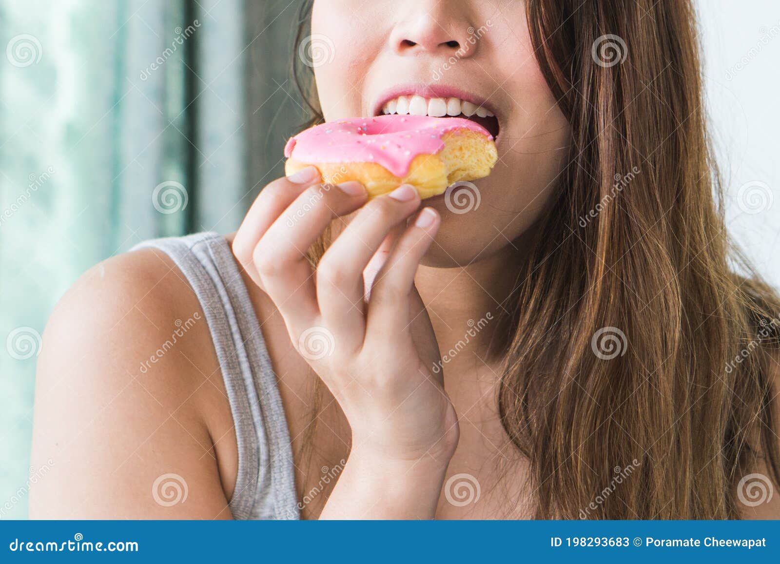 Woman Cheating during Diet and Eating Doughnut. Selective Focus on ...