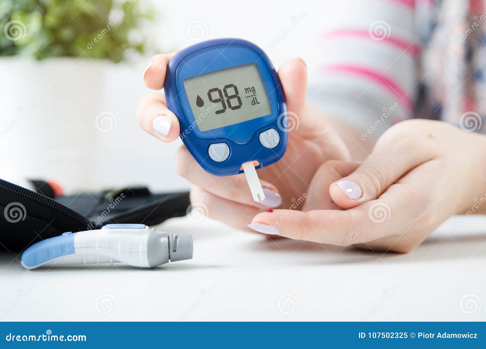 Woman Checking Blood Sugar Level by Glucometer Stock Image - Image of ...