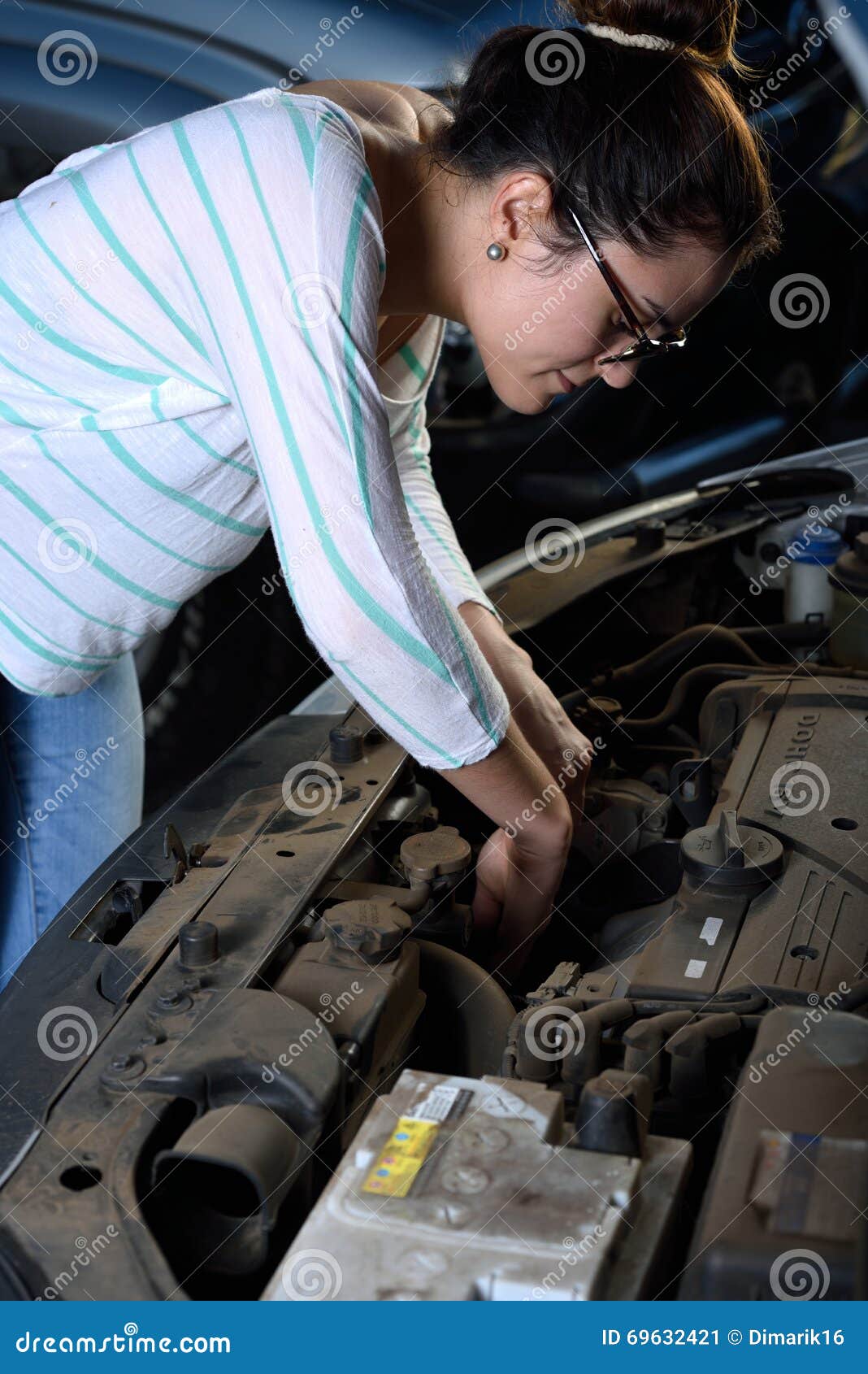 Woman checking engine stock image. Image of repair, bonnet - 69632421