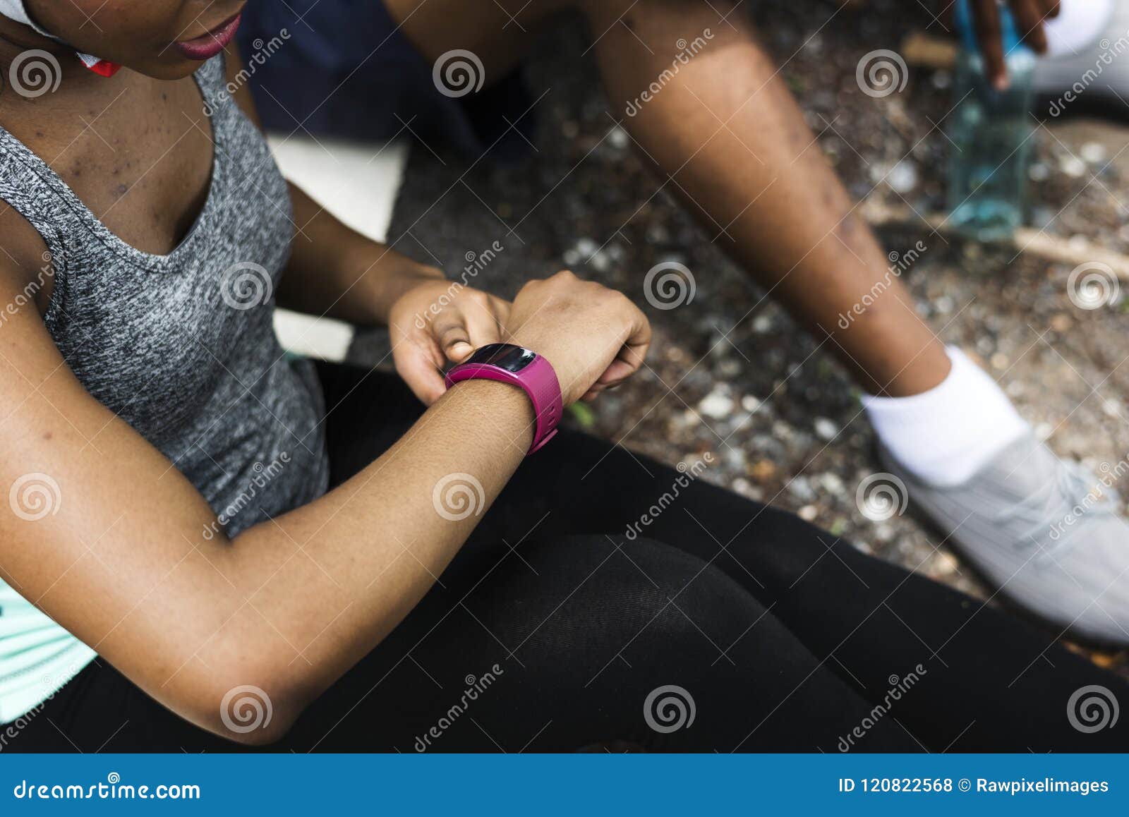 Woman Checking Her Smart Watch Stock Photo - Image of checking, rider ...