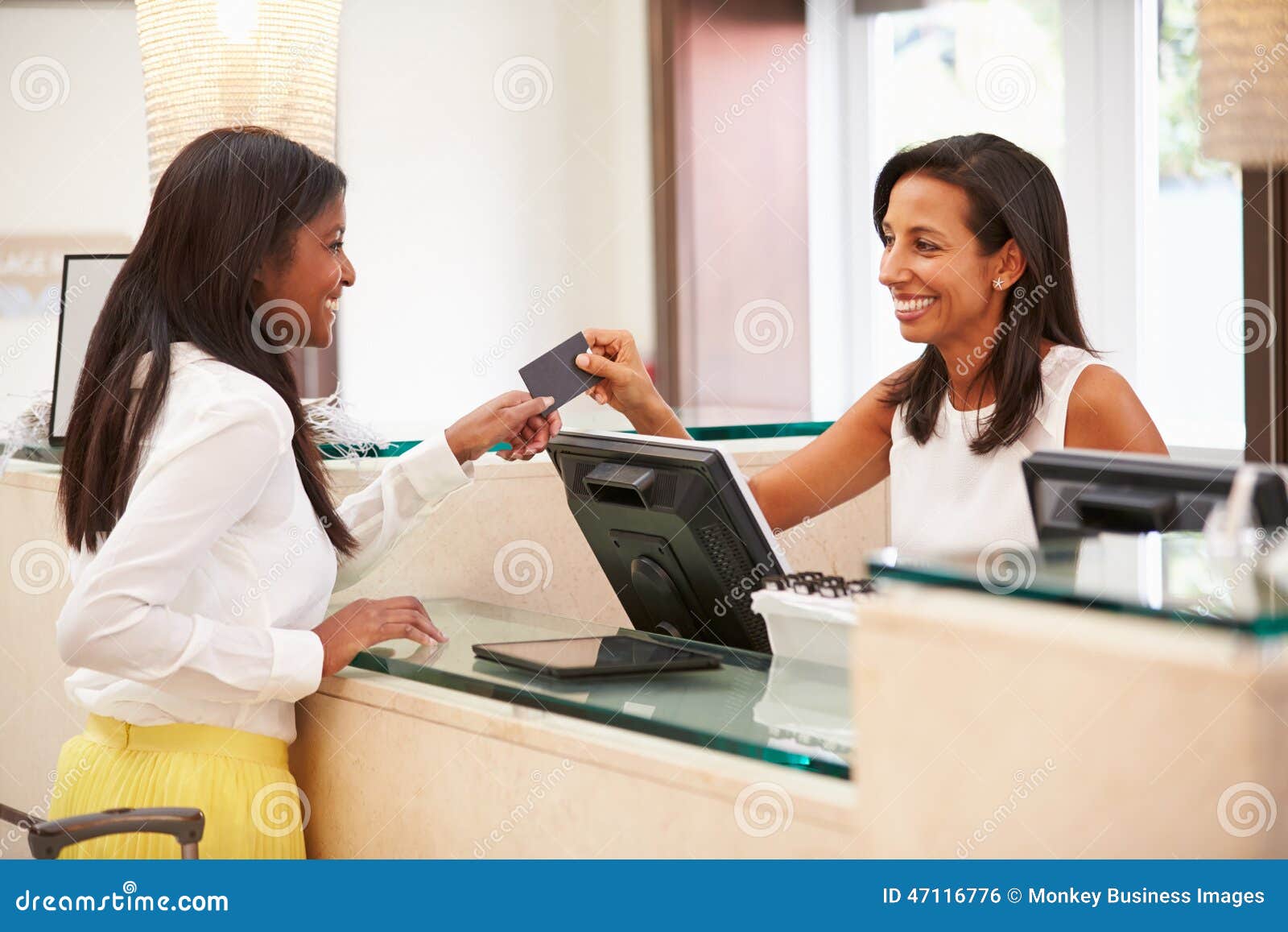 Woman Checking in at Hotel Reception Stock Photo - Image of occupation ...